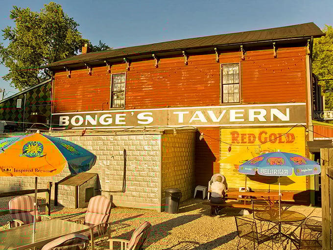 The unassuming red exterior of Bonge's Tavern stands like a culinary mirage in rural Indiana, promising legendary steaks to those who make the pilgrimage.