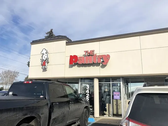 The unassuming exterior of The Pantry Restaurant stands like a breakfast beacon in Sterling Heights, promising morning glory without the fuss.