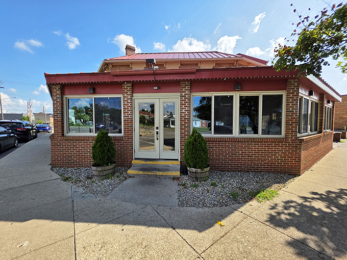The unassuming brick exterior of Old Canal Smoke House proves once again that the best barbecue joints don't waste energy on flashy facades—they're too busy smoking meat.