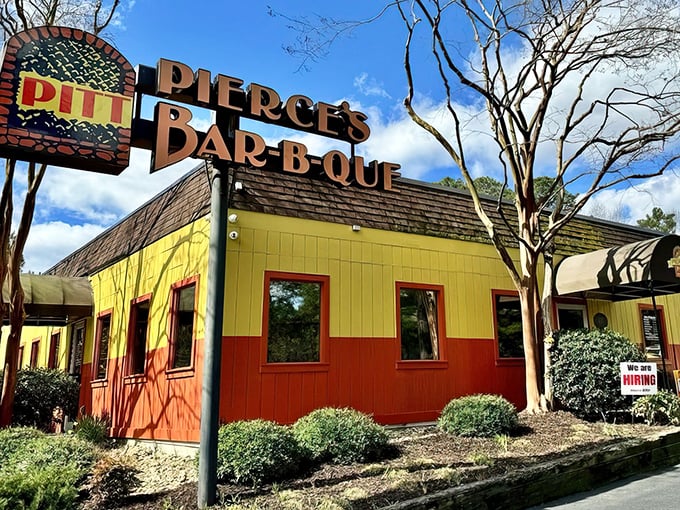 The sunshine-yellow exterior of Pierce's isn't just a building—it's a beacon of barbecue hope along I-64, promising smoky salvation to hungry travelers.