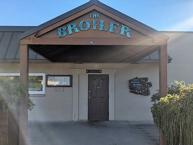 The unassuming entrance to The Broiler speaks volumes: culinary greatness doesn't need flashy neon or valet parking—just an honest promise of exceptional steak.