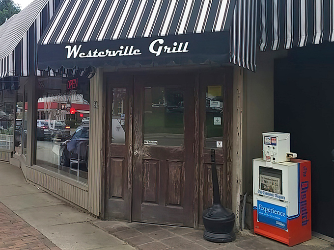The weathered wooden door of Westerville Grill stands like a portal to comfort food nirvana, beckoning hungry travelers with unpretentious charm.