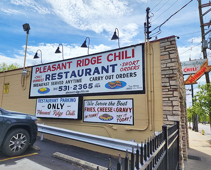 The iconic sign beckons like a lighthouse for the hungry—breakfast anytime, dinners, and the promise of Cincinnati's most beloved culinary tradition.
