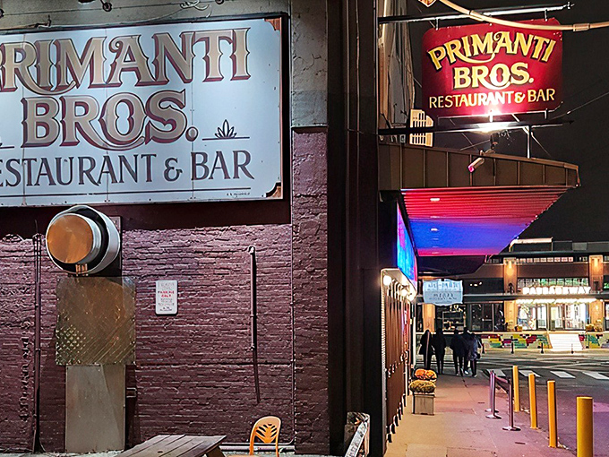 The Strip District legend stands ready for another day of sandwich architecture that defies physics and common sense.