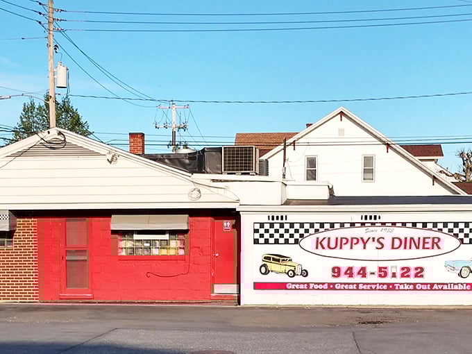 The red brick exterior of Kuppy's Diner stands as a time capsule in Middletown, where hungry patrons have been finding comfort food salvation since FDR was in office.
