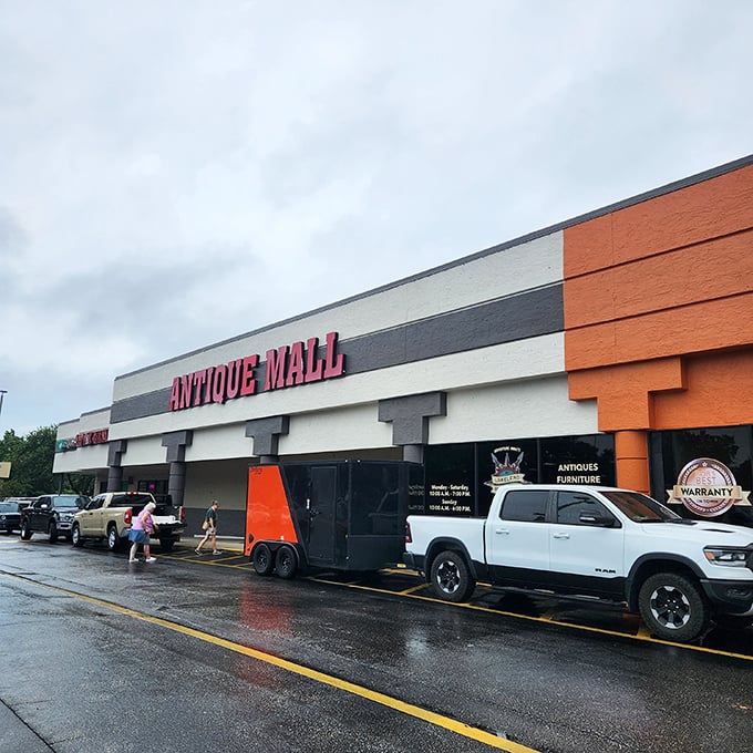 The orange-accented exterior of Lakeland Antique Mall stands ready for treasure hunters, rain or shine. Florida's weather may be unpredictable, but the treasures inside never disappoint.