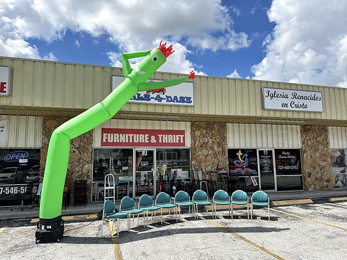 The iconic green tube man waves you in like an old friend with a secret – this unassuming storefront holds treasures beyond imagination.