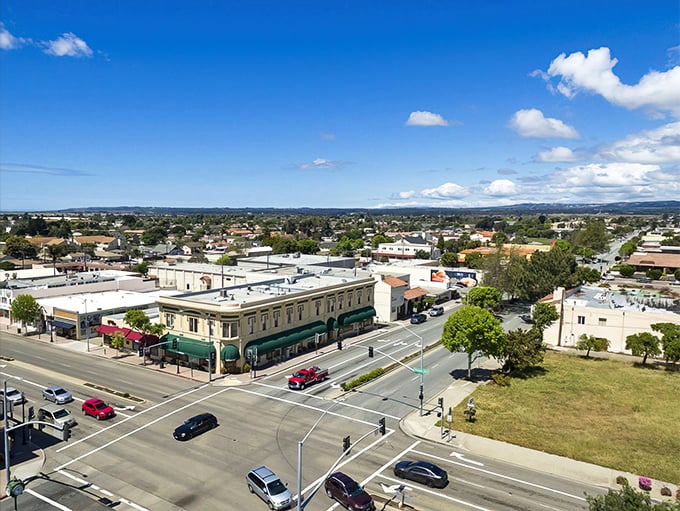 Downtown Lompoc stretches toward the horizon, where California small-town charm meets big sky country. Those mountains aren't just for show—they're nature's air conditioning.