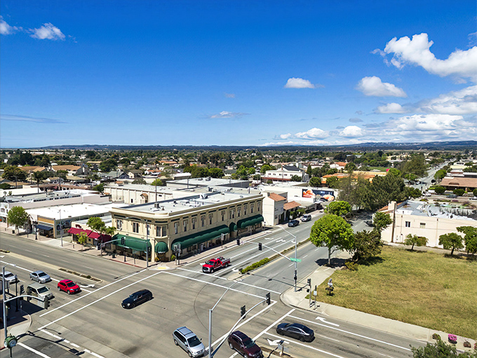 Downtown Lompoc stretches toward the horizon, where California small-town charm meets big sky country. Those mountains aren't just for show—they're nature's air conditioning.