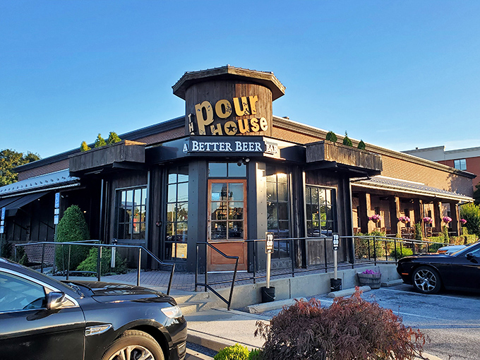 The octagonal entrance of The Pour House stands like a beacon for beer lovers and oyster enthusiasts alike, promising delicious discoveries within its wooden-framed walls.
