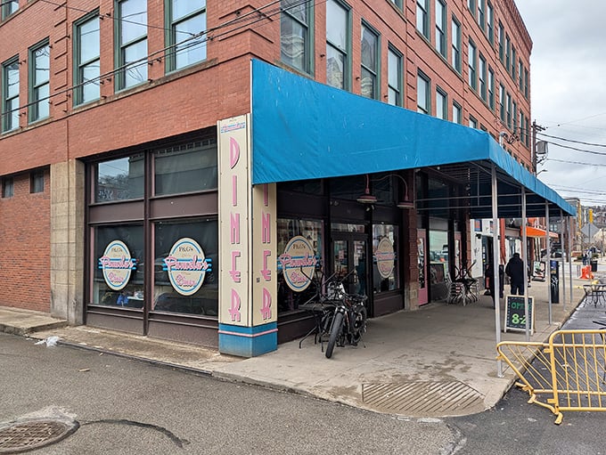 That blue awning isn't just decoration—it's a beacon of breakfast hope for those in-the-know about Pittsburgh's pancake paradise.