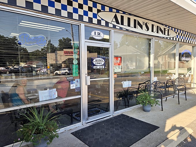 The blue-checkered facade of Allin's Diner promises no-nonsense breakfast magic, like finding the diner equivalent of Narnia in suburban St. Charles.