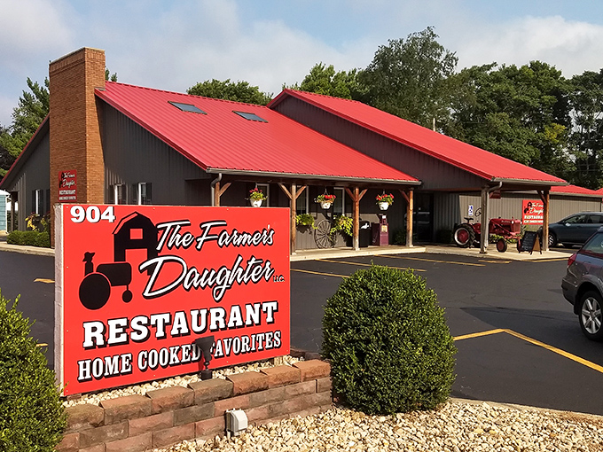 The iconic red roof of The Farmer's Daughter stands out like a beacon of comfort food promise in Urbana. Home-cooked favorites await inside this charming roadside gem.