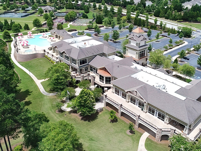 An aerial paradise where retirement dreams take flight. Sun City Peachtree's meticulously planned landscape offers recreation without reservation—just look at those tennis and pickleball courts!