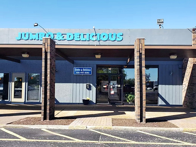 The blue sign beckons like a lighthouse for the hungry—Jumbo & Delicious isn't trying to be fancy, just fantastic.