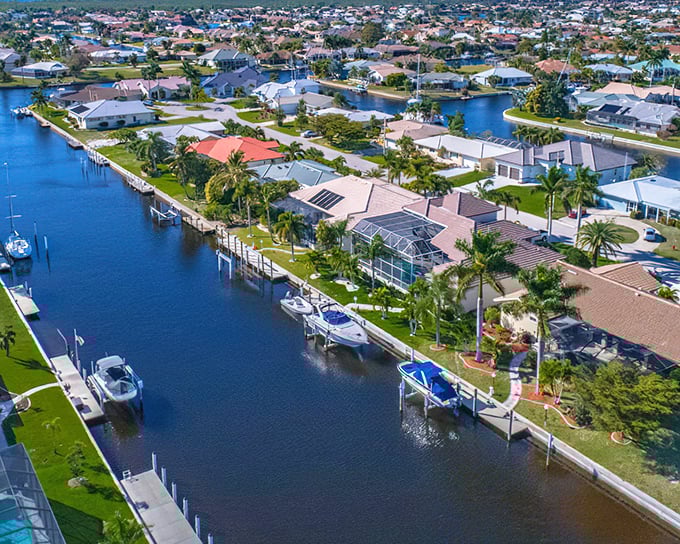 Port Charlotte's waterfront neighborhoods offer that perfect Florida dream – canals, greenery, and homes where your morning coffee comes with a water view.