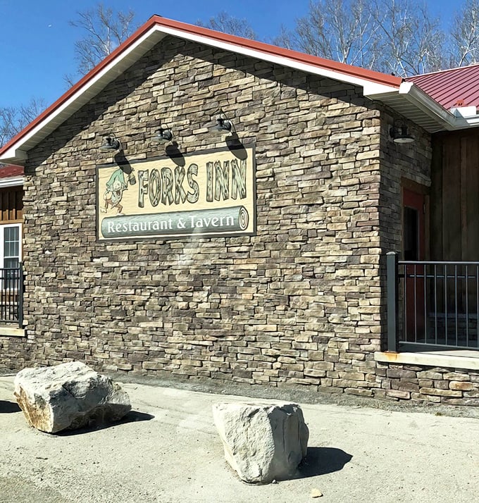The stone facade of Fork's Inn stands like a culinary fortress in Ligonier, promising comfort food treasures within those rustic walls. 