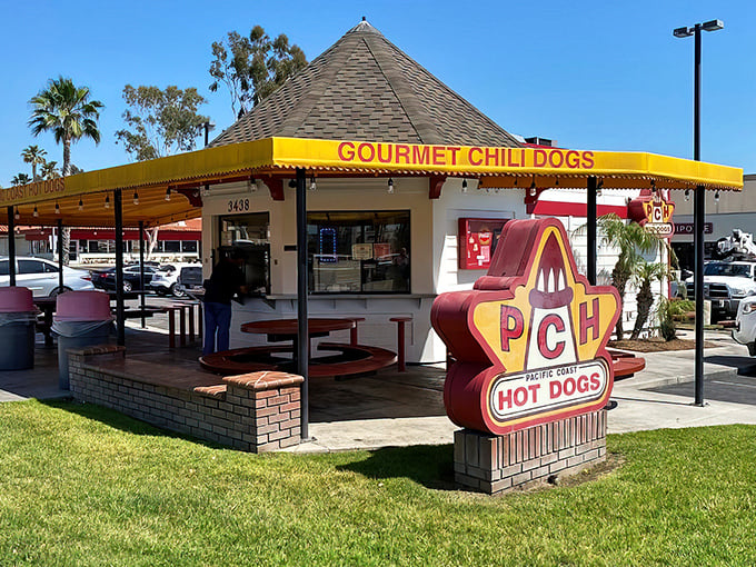The pyramid-shaped roof of PCH Hot Dogs stands like a beacon of hope for the hungry traveler. California sunshine makes everything look more appetizing.