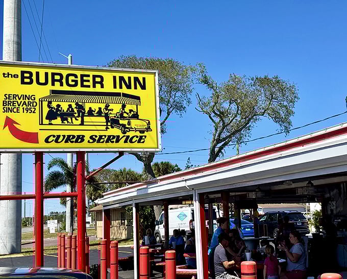 That iconic yellow sign has been beckoning hungry Floridians since the Eisenhower administration. Some landmarks change with time—this one perfected itself decades ago.