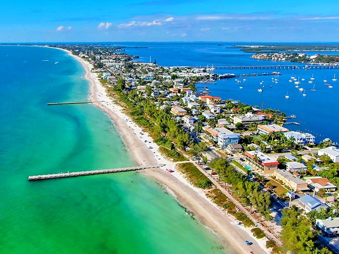 Anna Maria Island from above – where the Gulf of Mexico and Tampa Bay embrace like old friends reuniting after a long winter apart.