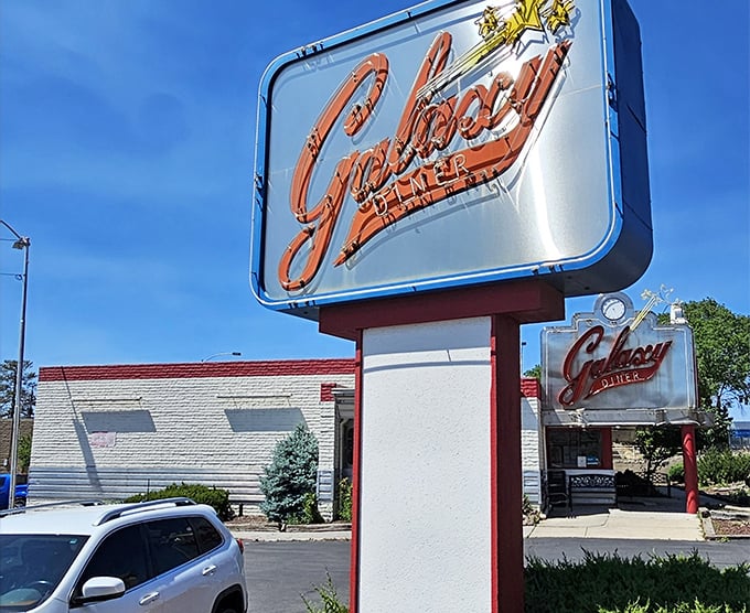 The neon glow of Galaxy Diner's sign against the Flagstaff sky isn't just illumination—it's a beacon calling hungry travelers home to Route 66 nostalgia.