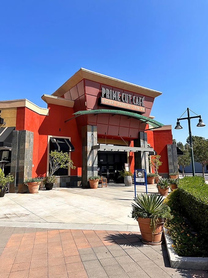 The vibrant terracotta exterior of Prime Cut Café stands out like a culinary beacon in Orange, promising delicious adventures within those walls.