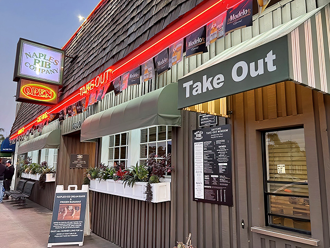 The unassuming exterior of Naples Rib Company hides culinary treasures within, like a BBQ speakeasy that forgot to keep the secret.