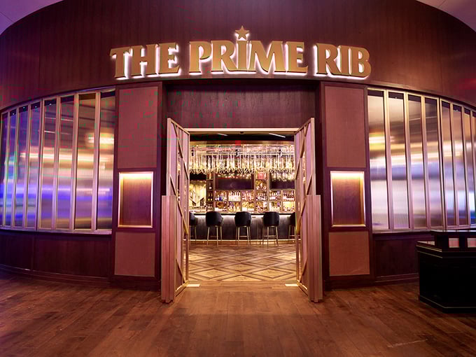 Those golden doors might as well be a time machine – step through and suddenly you're in the Rat Pack's favorite hideaway.