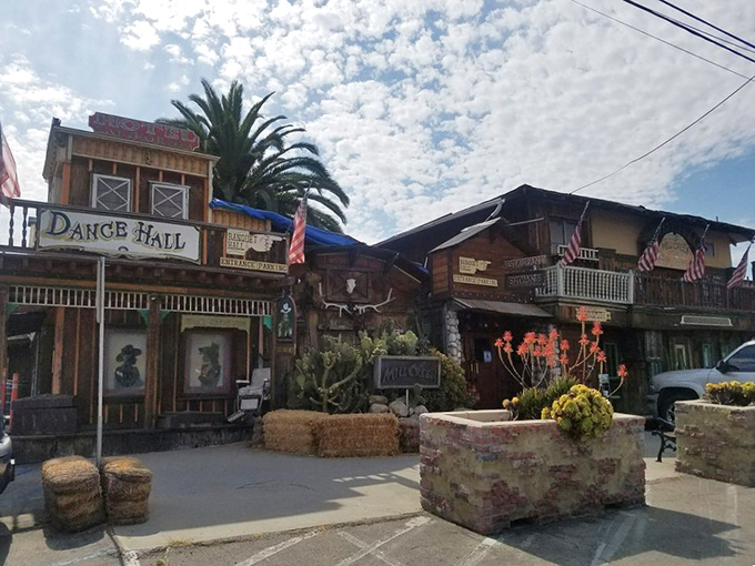 Step back in time at this Old West wonderland where the "Dance Hall" sign promises more than just great food—it promises an experience.