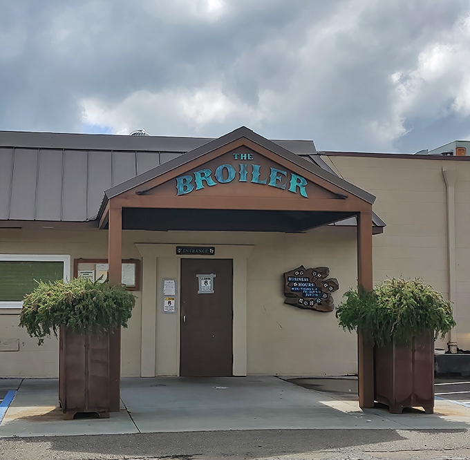 The unassuming entrance to The Broiler speaks volumes: culinary treasures don't always hide behind fancy facades. This is steak sanctuary, not a fashion show.
