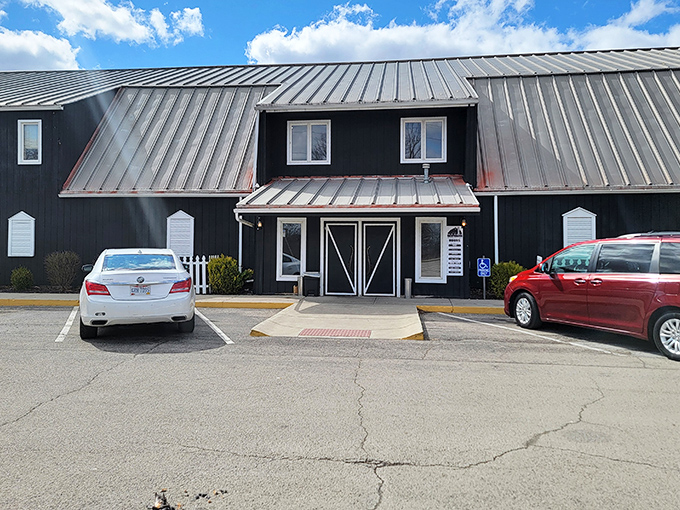 The black exterior with its distinctive metal roof isn't just country chic—it's a beacon for hungry travelers seeking authentic Ohio comfort food.