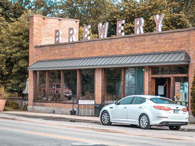 The unassuming brick façade of Greenbush Brewing Co. stands like a beacon for hungry travelers. That "BREWERY" sign isn't just decoration—it's a promise.