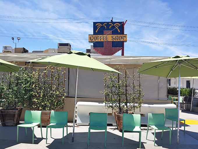 The ivy-covered exterior of 24th Street Cafe stands like a green oasis in Bakersfield, promising comfort food treasures behind its unassuming facade.
