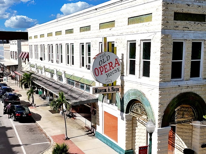 The Old Opera House stands as Arcadia's crown jewel, its vintage sign beckoning visitors into a world where history and commerce dance together beautifully.