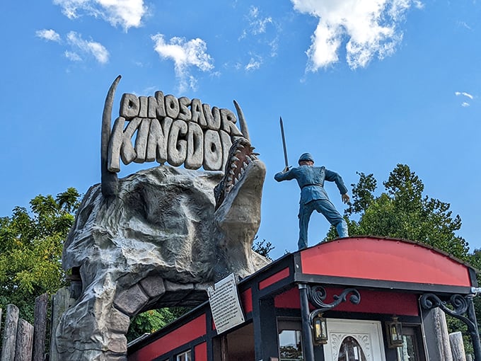 The grand entrance to alternate history – a Union soldier stands atop the Dinosaur Kingdom sign, perhaps regretting his life choices.