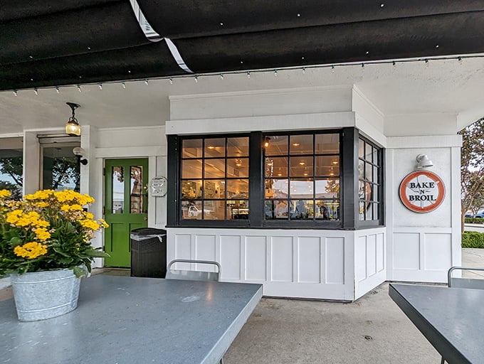 The iconic Bake n Broil sign promises "Simply Good Food" – a refreshing understatement that belongs in the Modesty Hall of Fame.