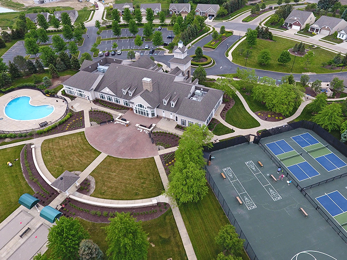 Perfectly planned paradise from above—neat rows of homes surround a community center that serves as the beating heart of Pioneer Ridge.