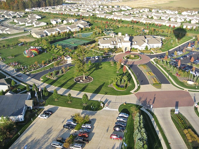 Perfectly planned paradise from above—neat rows of homes surround a community center that serves as the beating heart of Pioneer Ridge.