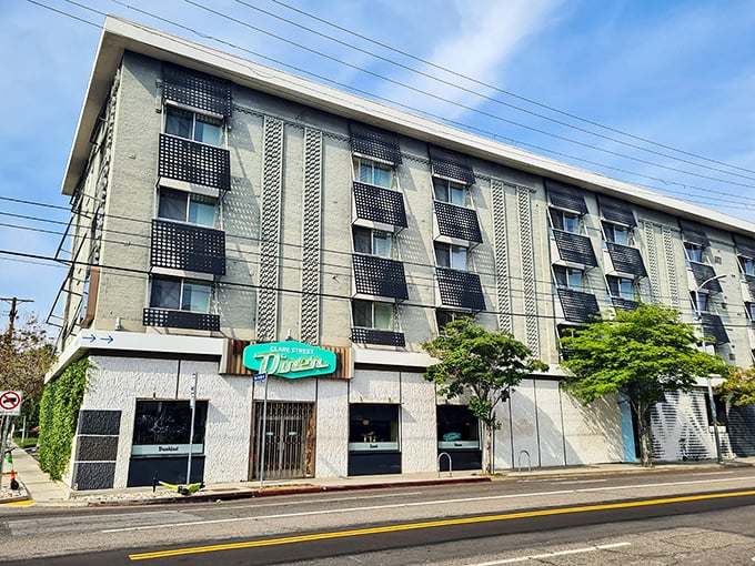 The unassuming exterior of Clark Street Diner hides beneath an apartment building like Clark Kent's superhero identity – modest on the outside, magnificent within.