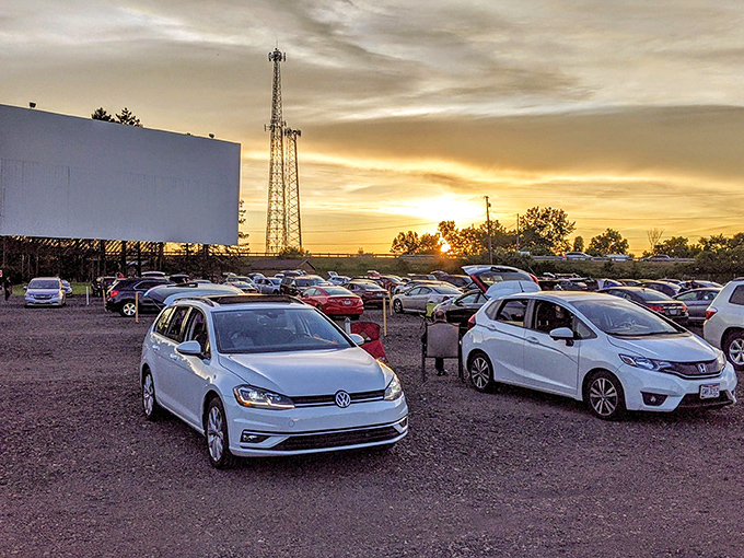 Sunset magic at the Aut-O-Rama, where modern cars line up for an experience their grandparents would recognize—some things just get better with time.