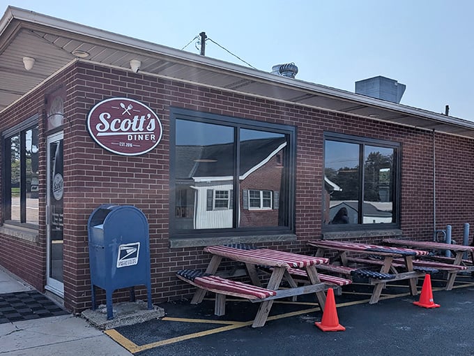 Scott's Diner announces itself with vintage charm – a hanging sign that promises "Breakfast Done Right" and a brick exterior that feels like coming home.