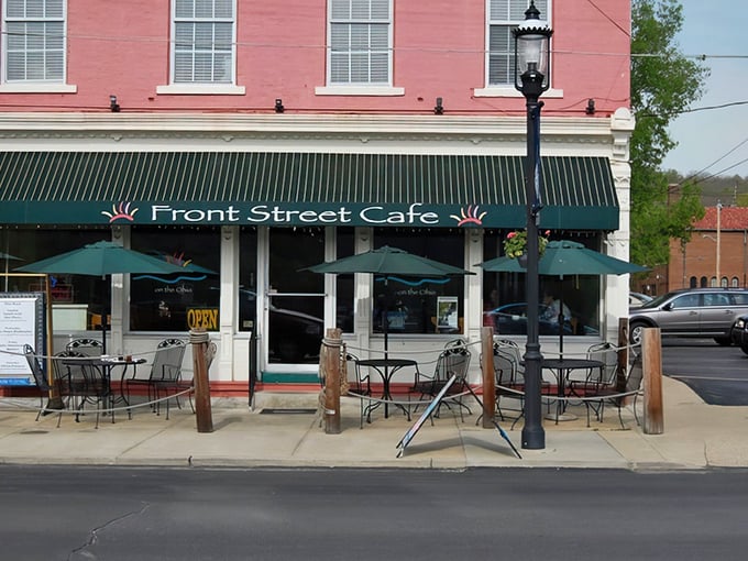 The pink building with green awnings isn't trying to be Instagram-famous—it's too busy making sandwiches that will haunt your dreams in the best way possible.