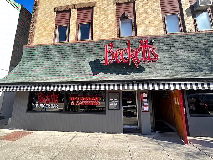 The classic brick façade and bold red signage of Beckett's stands as a beacon of comfort food excellence in downtown Bowling Green.