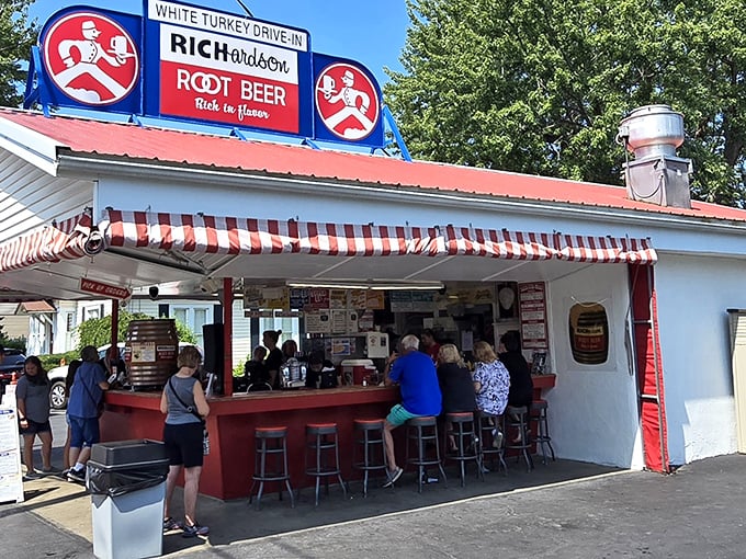 The iconic White Turkey Drive-In stands proudly in Conneaut, with its vintage Richardson Root Beer sign promising summer memories that taste even better than they sound.
