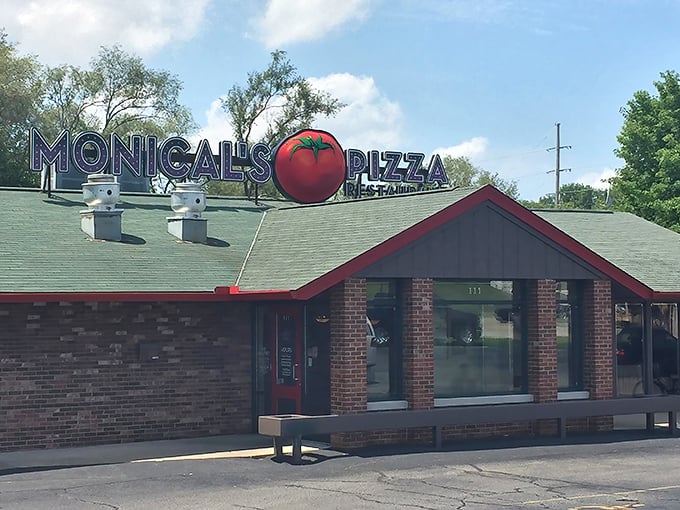 That bright tomato logo against the green roof is unmistakable – like a beacon of hope for the pizza-deprived traveler on Illinois highways.