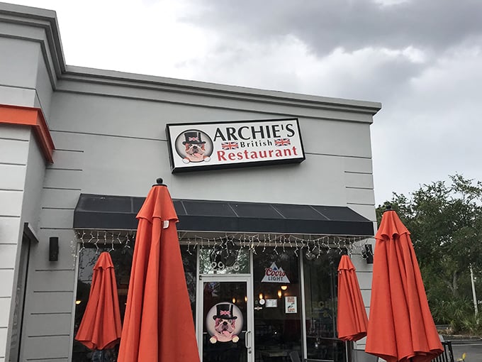Archie's welcomes you with bright orange umbrellas and a dapper cartoon gentleman, like Britain's cheerful outpost in the Florida sunshine.