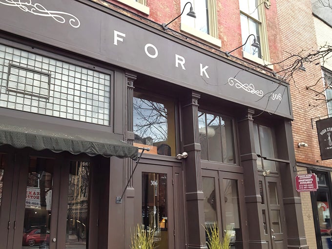 Fork's understated exterior belies the culinary magic happening inside. The elegant signage and classic brick façade set the perfect stage for what's to come.
