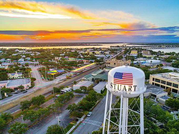 Stuart's iconic water tower stands sentinel over this charming coastal town, where golden sunsets paint the sky and waterways embrace the landscape.