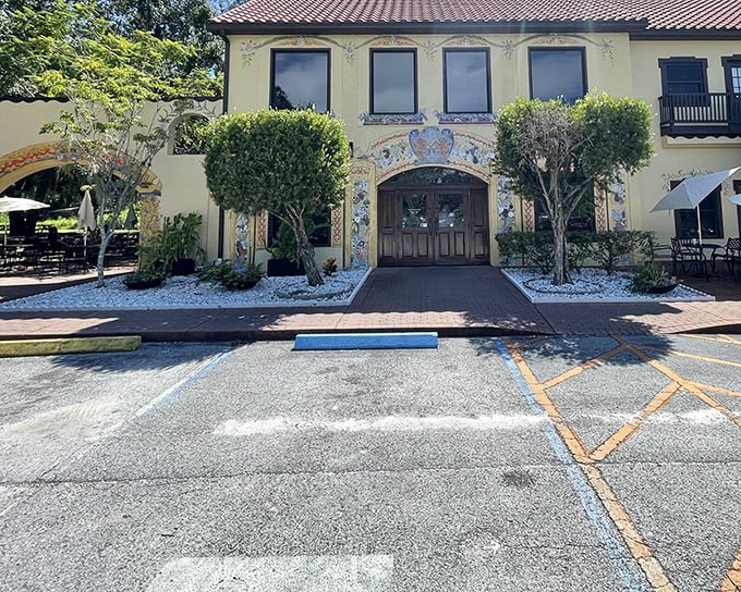 The Mediterranean-meets-Bavaria façade of Yalaha Bakery stands like a delicious mirage in Central Florida, promising authentic German treats behind those ornate doors.