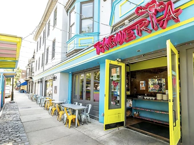 That turquoise and yellow facade isn't just eye-catching – it's a beacon calling hungry souls to taco paradise.